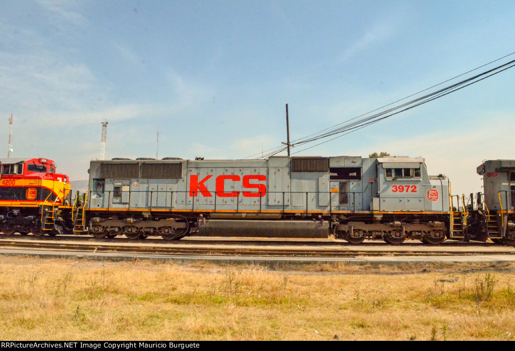 KCS SD70MAC locomotive in gray paint scheme - ex TFM